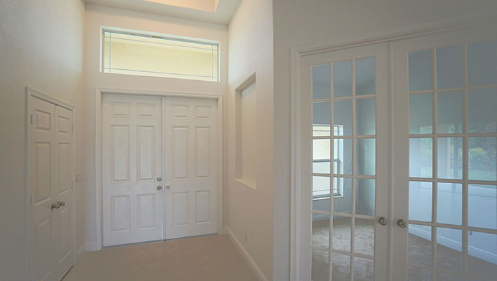 Transom Window Entry + French Doors - RJM Custom Homes